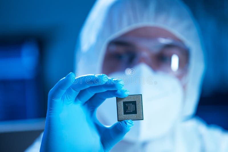 Microelectronics Engineer Works in a Modern Scientific Laboratory on ...