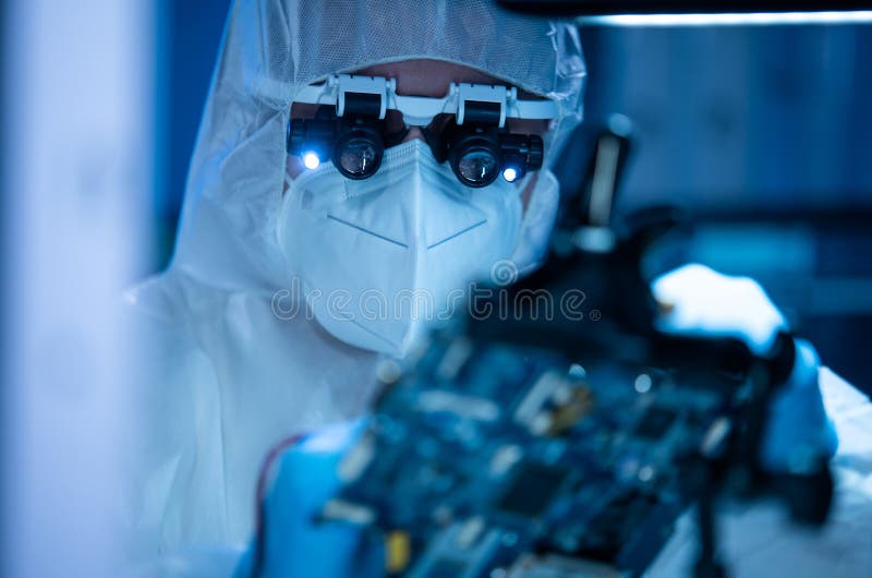 Microelectronics Engineer Works in a Modern Scientific Laboratory on ...