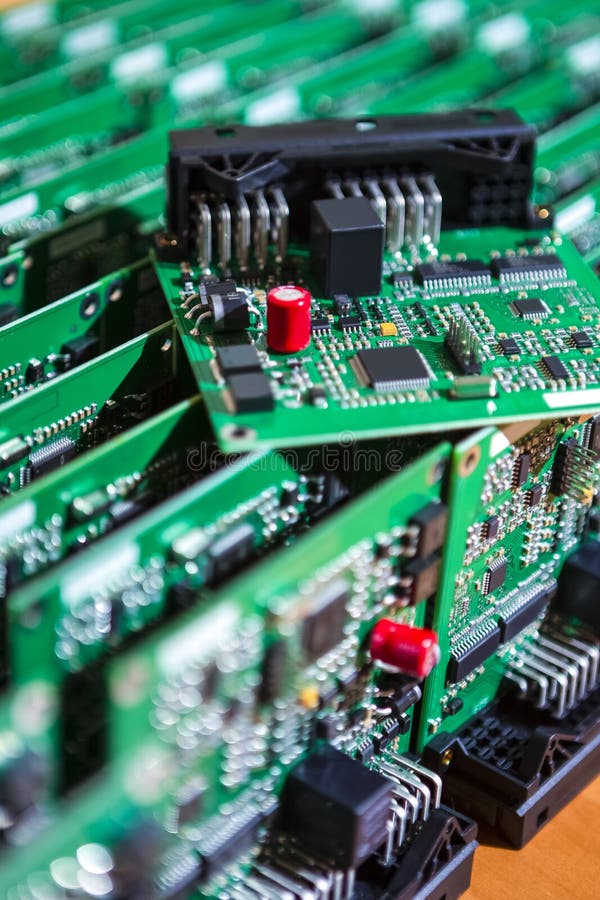 Microelectronics Industry and Manufacturing. Stack of Produced Printed ... Microelectronics Industry and Manufacturing. Stack of Produced Printed ...
