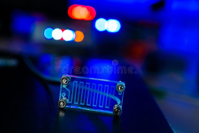 Microfluidic Device Instrument that Uses Micro Amounts of Fluid on a ...