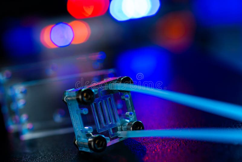 Microfluidic Device Instrument that Uses Micro Amounts of Fluid on a ...