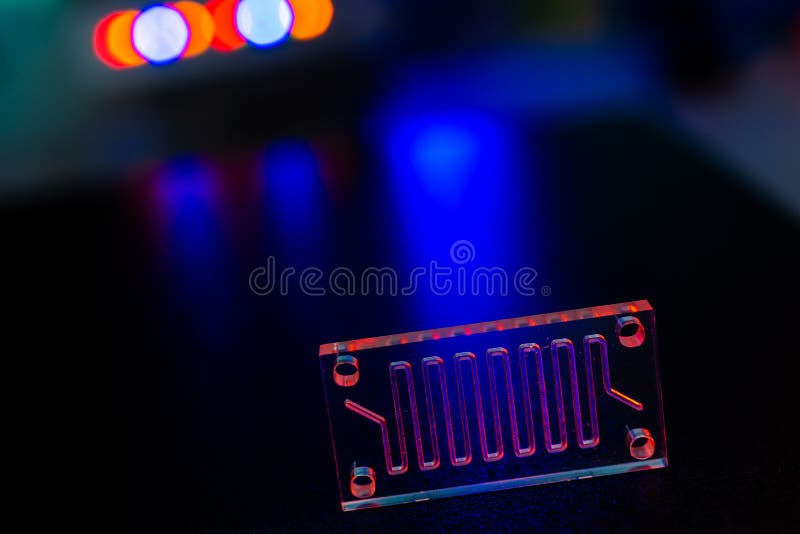 Microfluidic Device Instrument that Uses Micro Amounts of Fluid on a ...