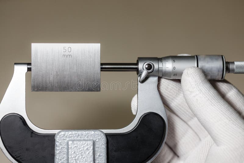 Micrometer with gage block stock photo. Image of gauges - 39131988