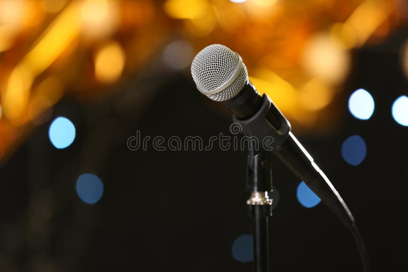 Microphone Against Festive Lights, Space For Text. Musical Picture ...
