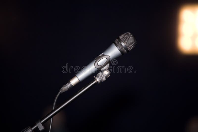 Microphone on Air Over Green Grass at Background Stock Image - Image of ...