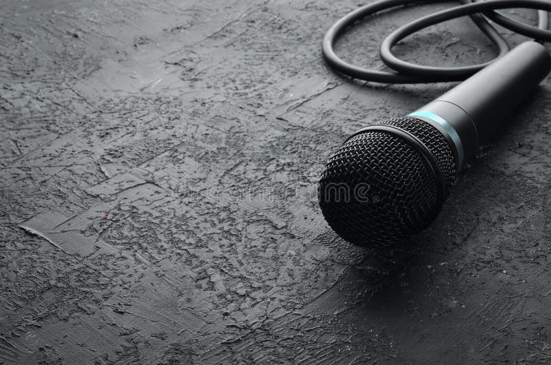 Microphone on Black Stone Table. Studio. Top View Stock Image - Image ...