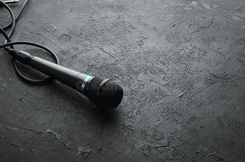 Microphone on Black Stone Table. Studio. Top View Stock Photo - Image ...