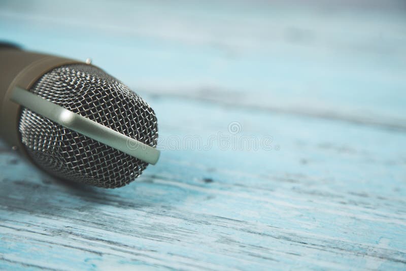 Microphone on Blue Background Stock Image - Image of vintage, music ...