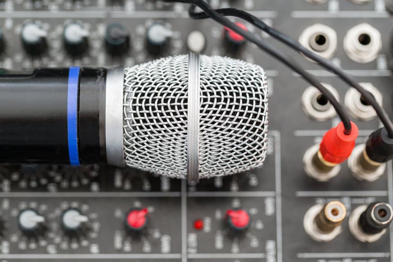 Microphone Close-up. Focus on Mic. Event Concept. Music Mixer Equalizer ...
