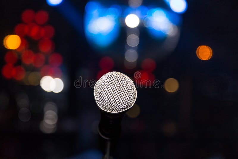 Microphone in Club on Background of a Bright Lights Stock Image - Image ...
