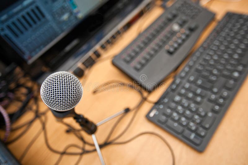 Microphone and Computer Keyboards on Table at Television Studio Stock ...