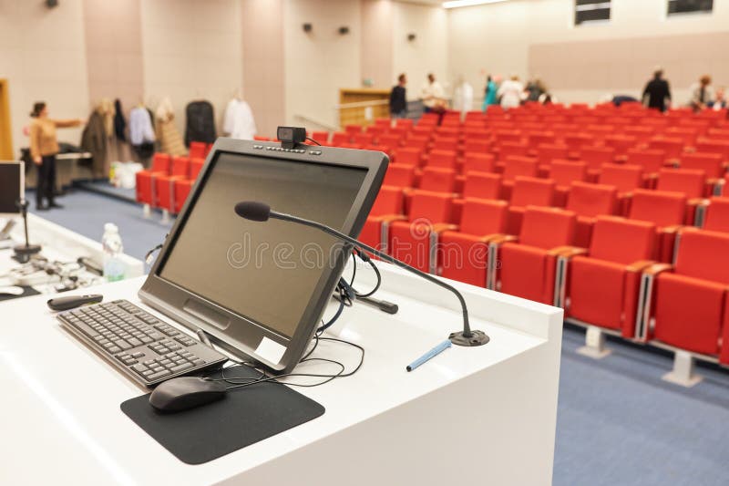 Microphone with Computer at Podium in Convention Center Stock Image ...