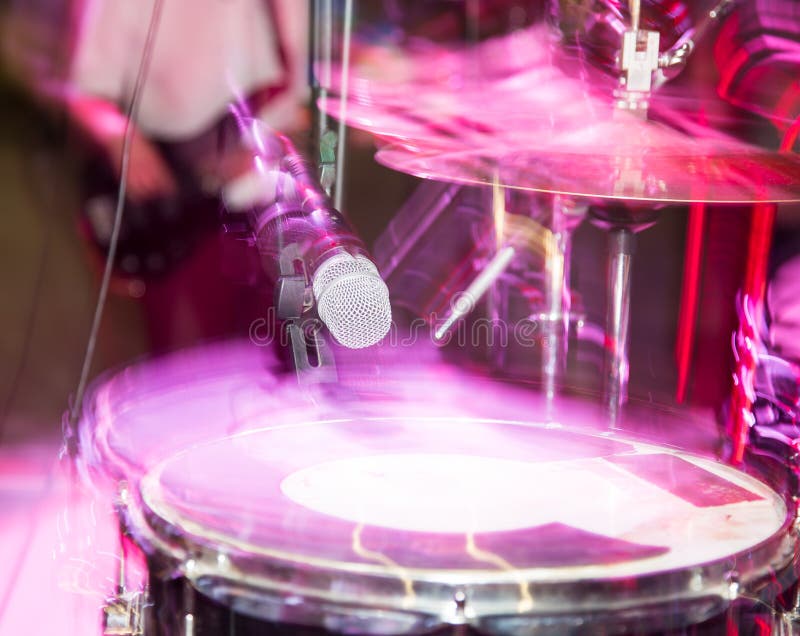 Microphone with Drums and Other Musical Instruments on a Outdoor Stage ...