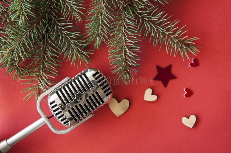 Microphone and Fir Branches Against Red Lights, Space for Text Stock ...