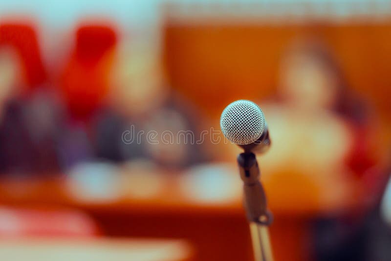 Microphone in Front of an Audience at a Press Conference Event Stock ...