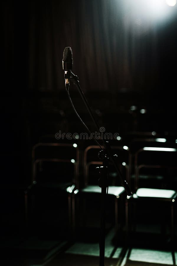Microphone in Front of Empty Rows in Small Dark Hall Stock Image ...