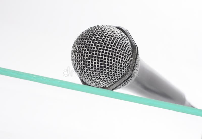 Microphone on the Glass Table Stock Photo - Image of sloping, slanting ...