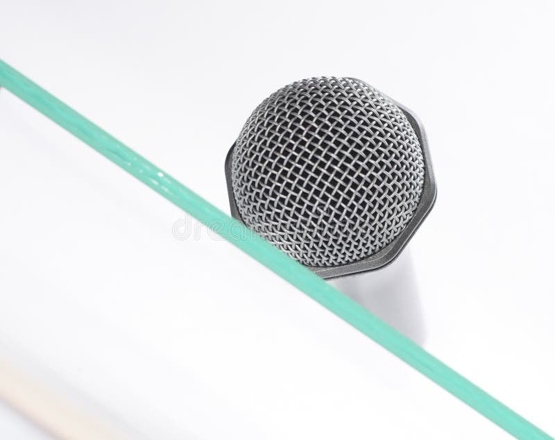 Microphone on the Glass Table Stock Photo - Image of sloping, slanting ...