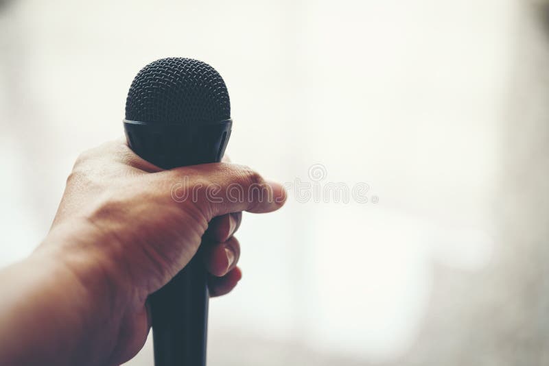Microphone on hand stock image. Image of expression - 102058523