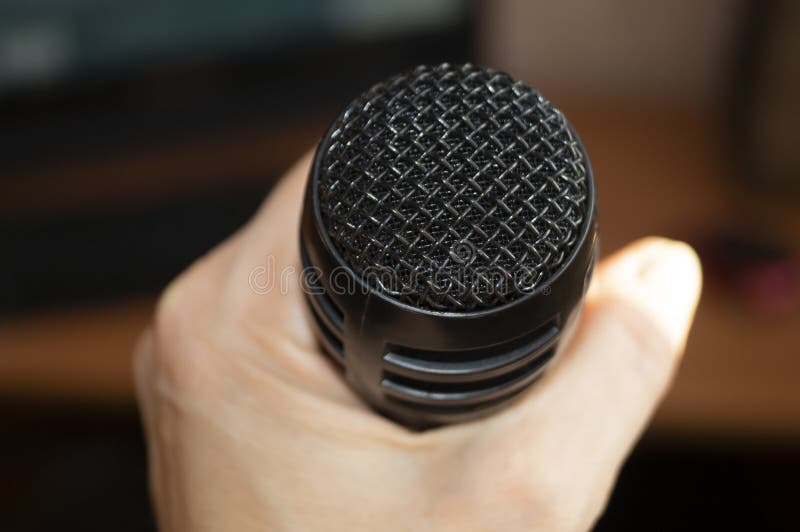 Microphone in hand stock image. Image of hand, broadcast - 13479969