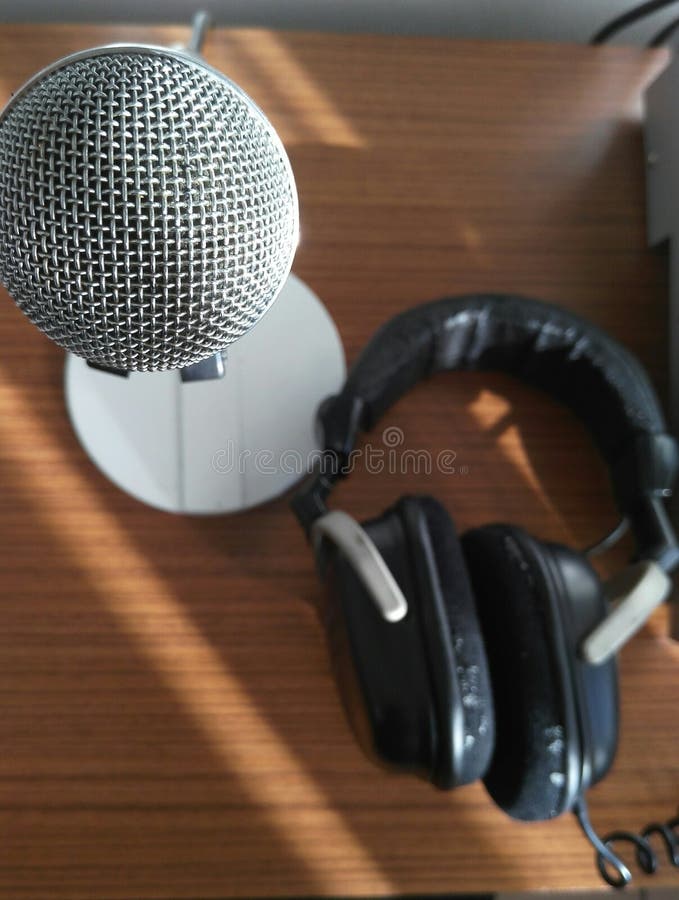 Microphone and Headphones on a Radio Studio Wood Table Stock Image ...