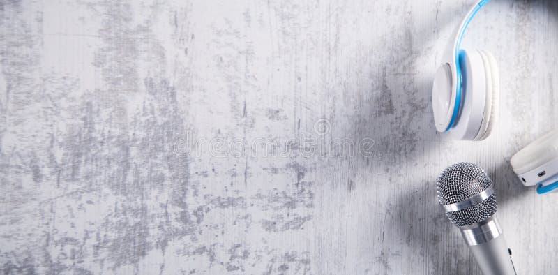 Microphone and Headphones on a White Desk. Top View Stock Image - Image ...