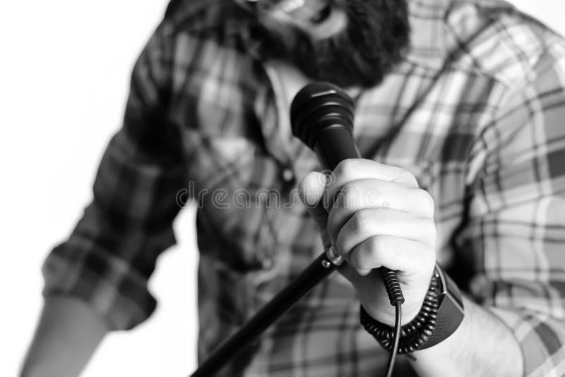 Man Singing Pose Holding Microphone Stock Photos - Free & Royalty-Free ...