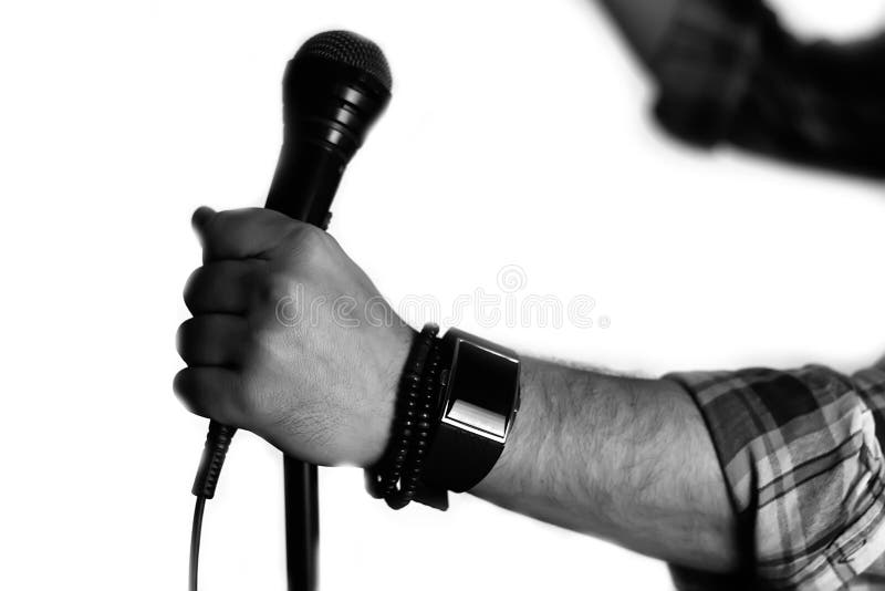 Man Singing Pose Holding Microphone Stock Photos - Free & Royalty-Free ...