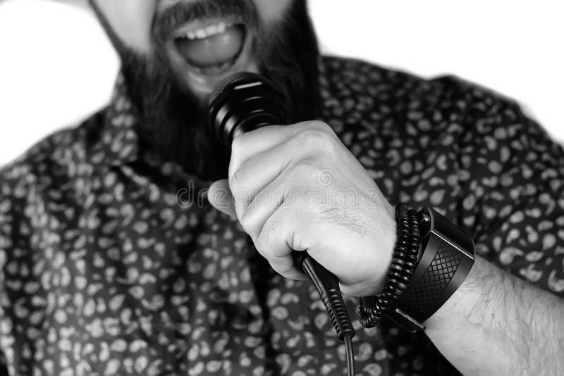 Man Singing Pose Holding Microphone Stock Photos - Free & Royalty-Free ...