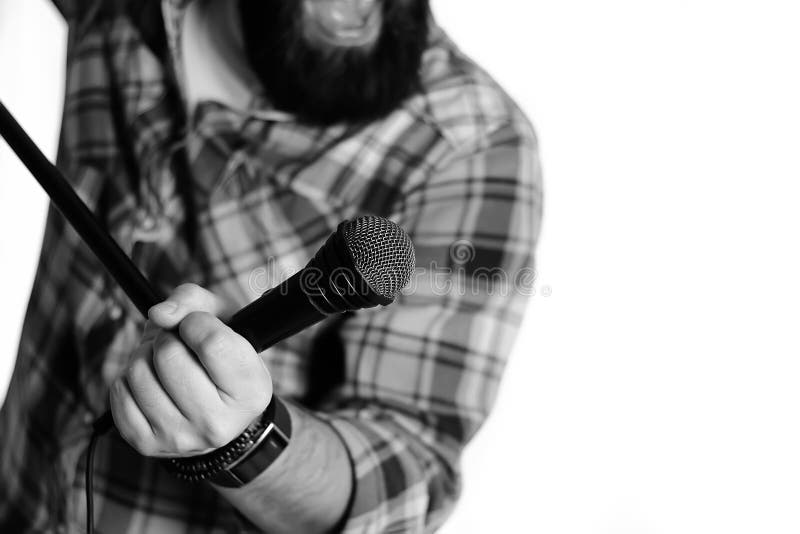 Man Singing Pose Holding Microphone Stock Photos - Free & Royalty-Free ...