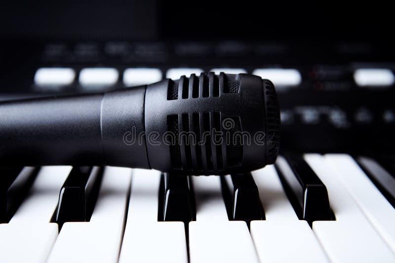 Microphone on keyboard. stock image. Image of instrument - 308690397