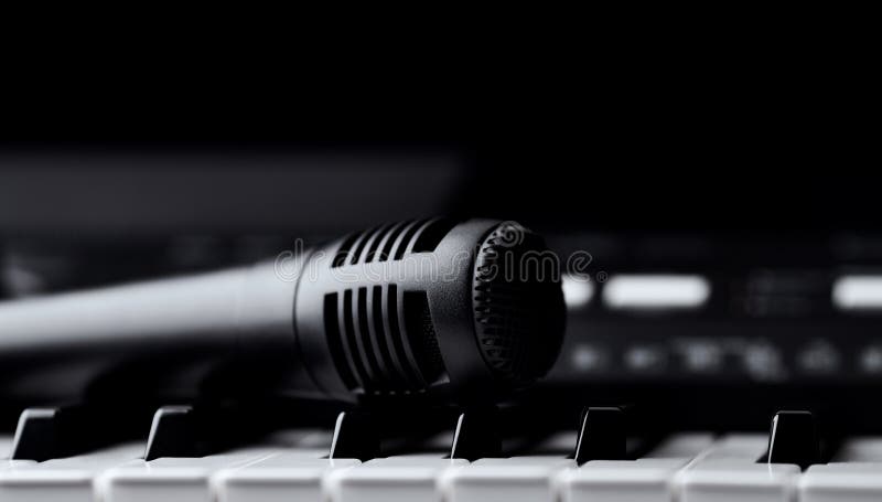 Microphone on keyboard stock image. Image of piano, electric - 196813157