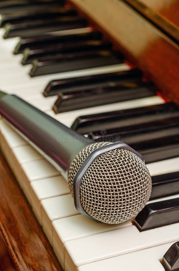 Microphone on Keyboard of Piano Stock Photo - Image of studio, macro ...