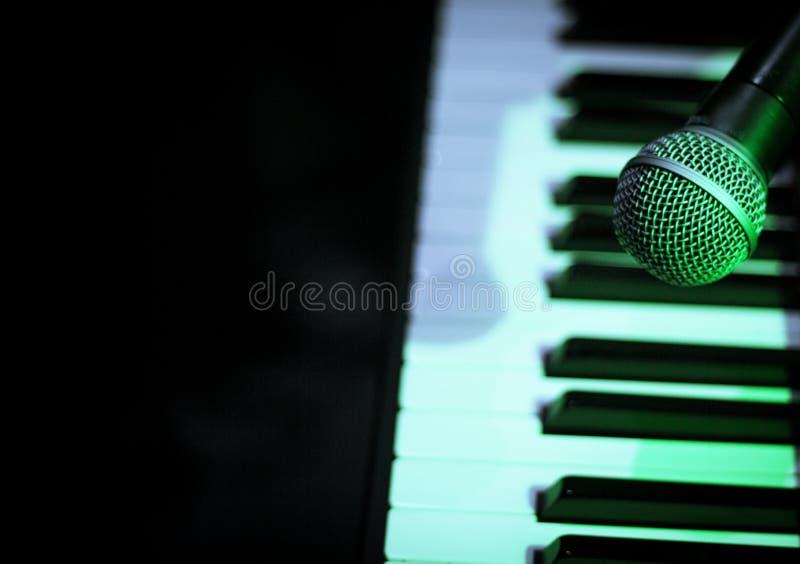 Microphone Over Piano Keys in Dim Light Stock Photo - Image of note ...