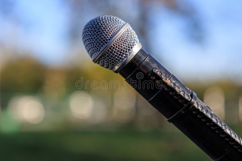 A Microphone is Pointed Up at the Camera Stock Photo - Image of voice ...