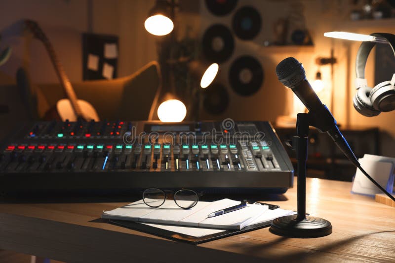 Microphone and Professional Mixing Console on Table in Radio Studio ...