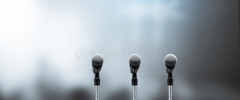 Close-up the Microphone on Stand for Speaker Speech Presentation Stage ...