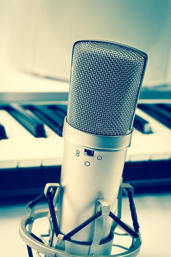 Microphone in Recording Studio on a White Background. Stock Image ...
