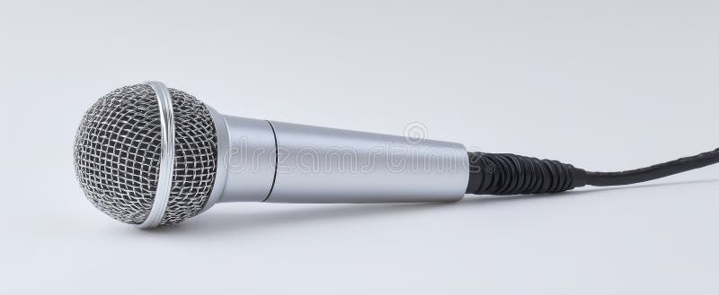 The Microphone Resting on a Clean, Minimalist Surface for Audio ...