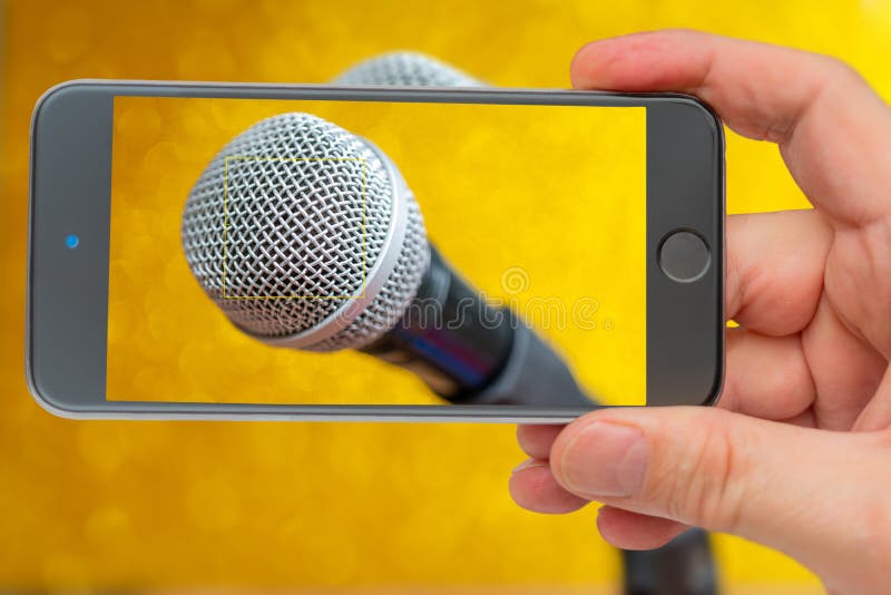 Microphone on Smartphone Screen. Professional Dynamic Microphone Stock ...
