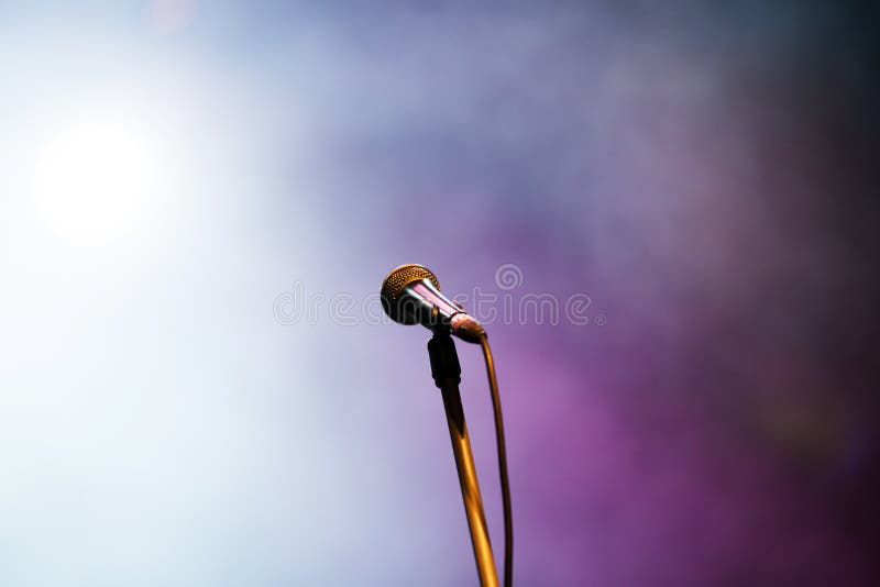 Microphone and Wooden Stool on a Stand Up Comedy Stage with Reflectors ...
