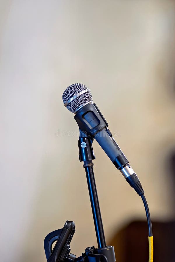 A Microphone on a Stand with a Microphone Attached To it Stock Photo ...