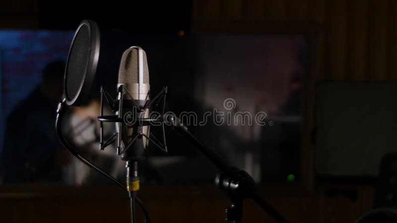 Microphone on a Stand Located in a Music Studio Recording Booth Under ...