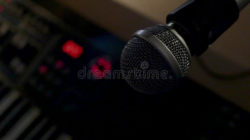 Microphone on a Stand Located in a Music Studio Recording Booth Under ...