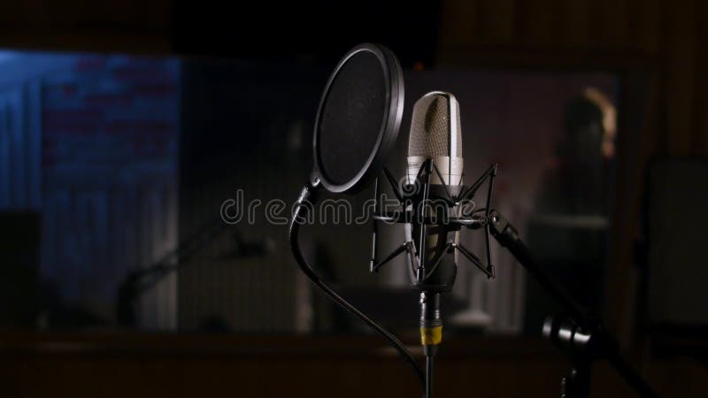 Microphone on a Stand Located in a Music Studio Recording Booth Under ...