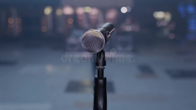 The Microphone on the Stand Stands on the Stage in the Beautiful Light ...