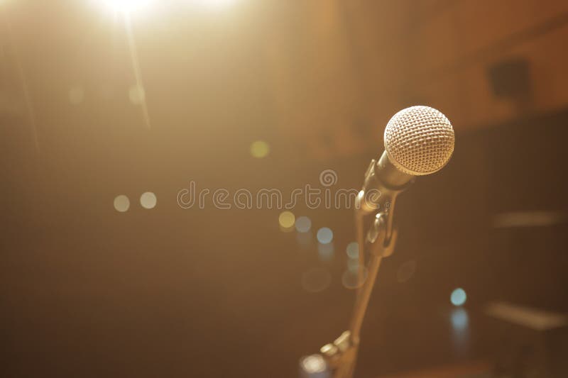 Microphone Waiting for Singer on Stage Under Warm Light Stock Photo ...