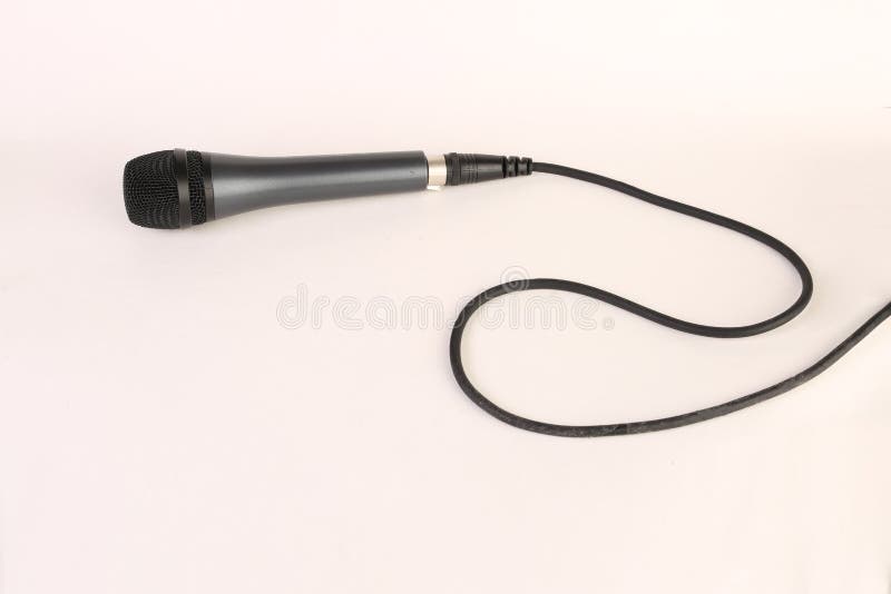 A Microphone on the Ground and Blurred Photo of Conference Hall or ...