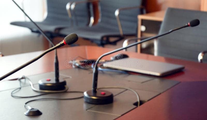 Microphone on a Wooden Table of a Boardroom Stock Photo - Image of ...