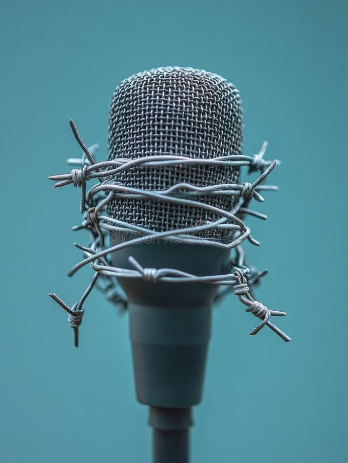 Microphone Wrapped in Barbed Wire on a Blue Background. Stock Photo ...